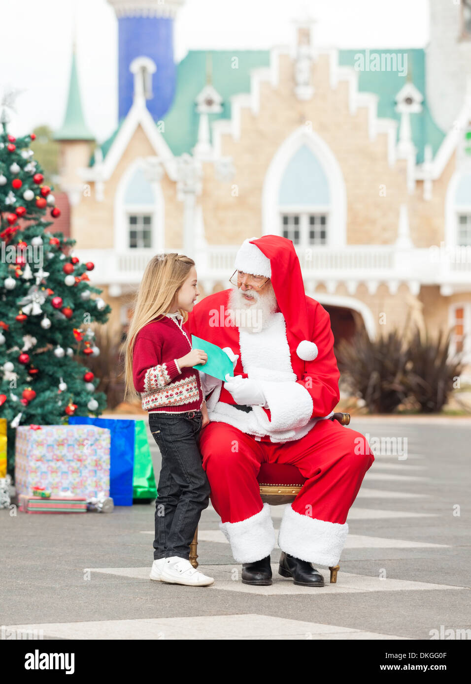 Santa claus deliver gift child hi-res stock photography and images - Alamy