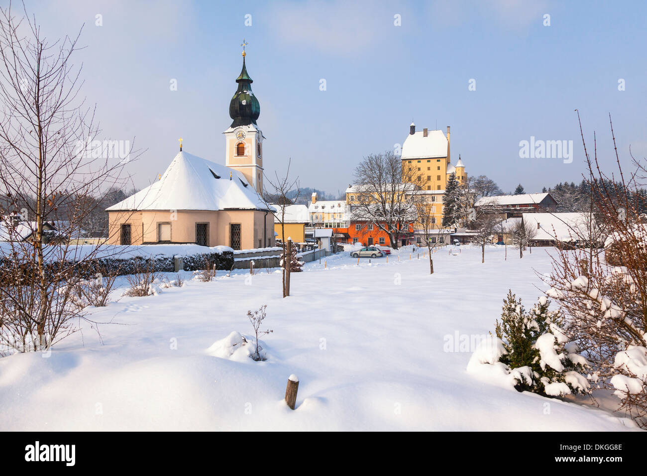 Goldenstein castle and parish church of Elsbethen in winter, Salzburg ...