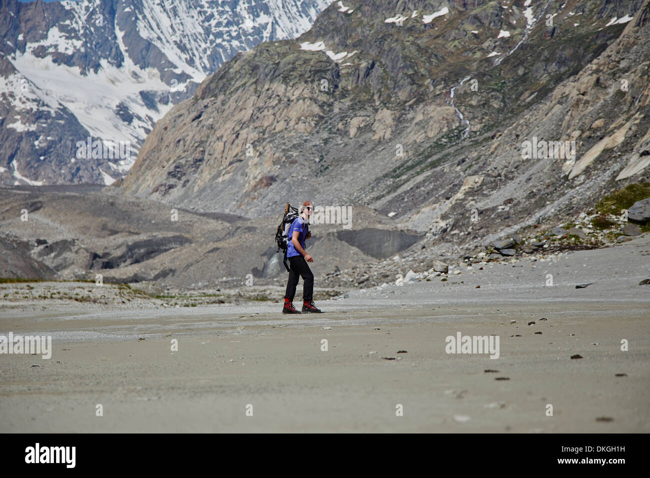 Man hiking at Lauteraar Glacier, Bernese Oberland, Switzerland Stock ...