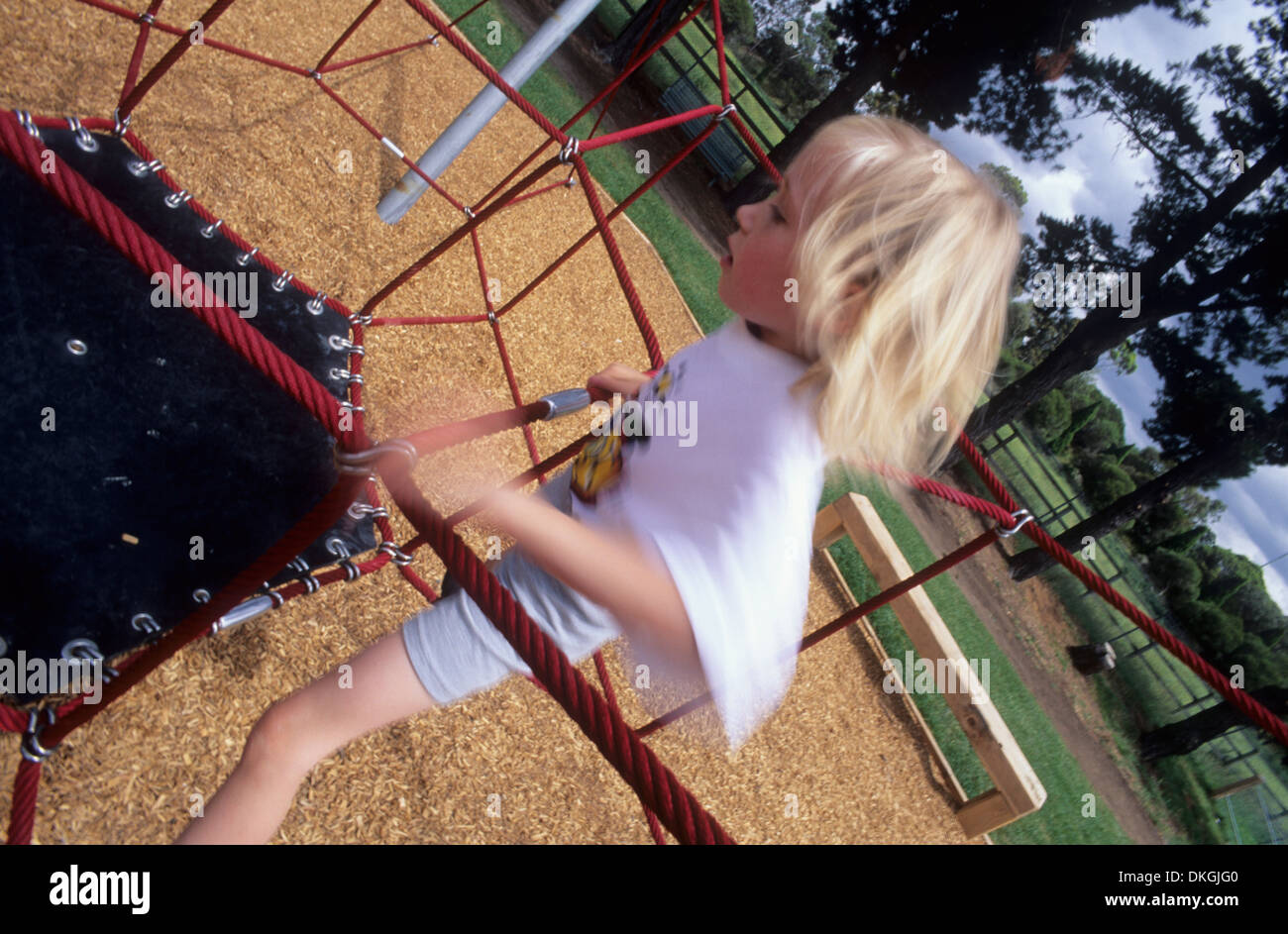 Children, young girl on climbing maze Stock Photo - Alamy