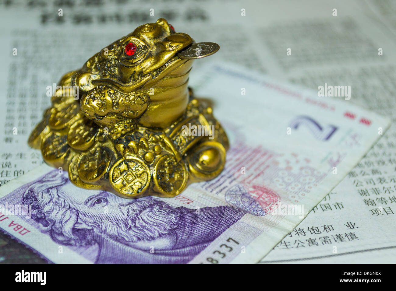Money toad on Chinese newspaper and two Bulgarian leva banknote (BGN ...