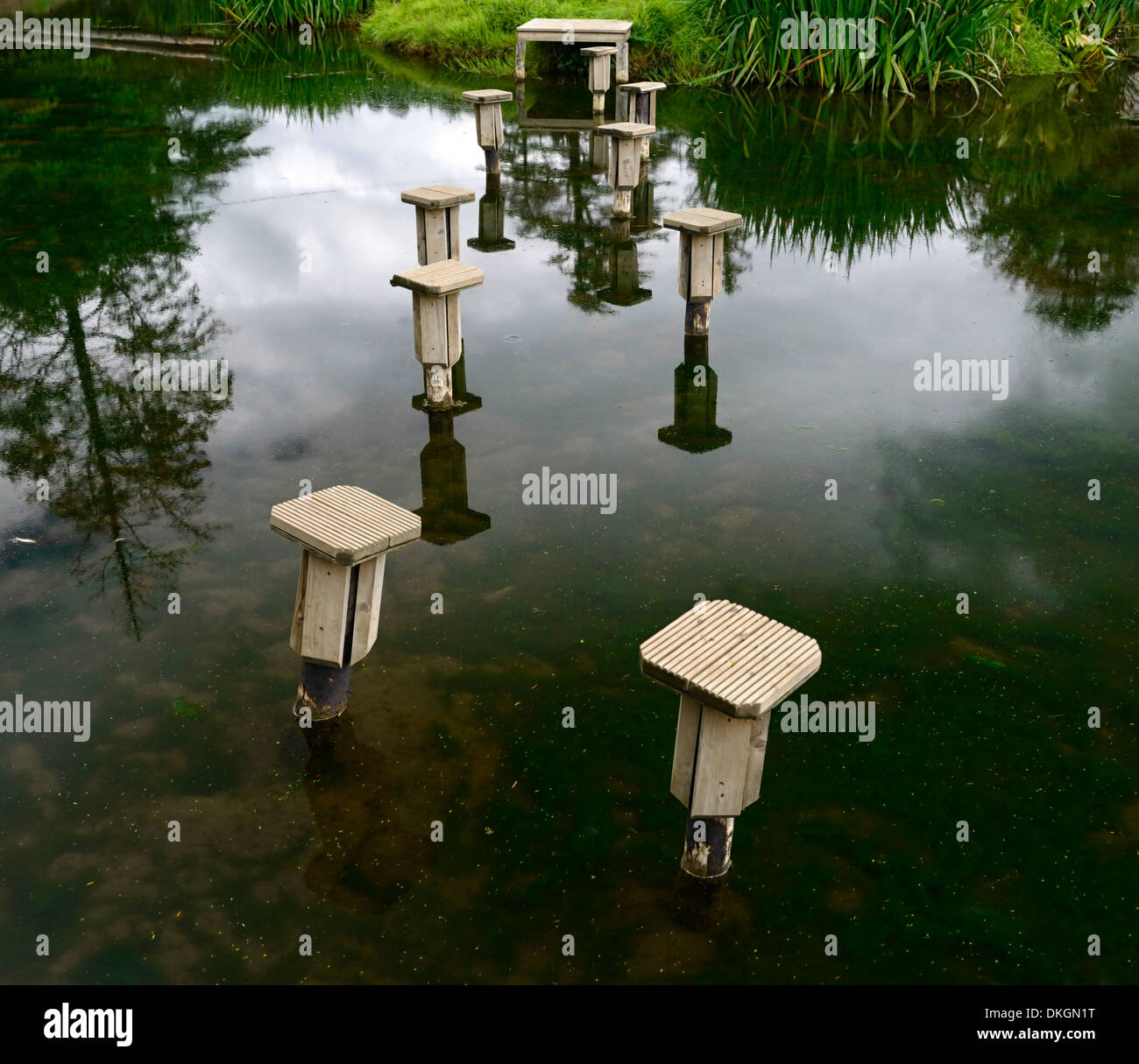 wood wooden posts steps stepping path pond water feature garden ...