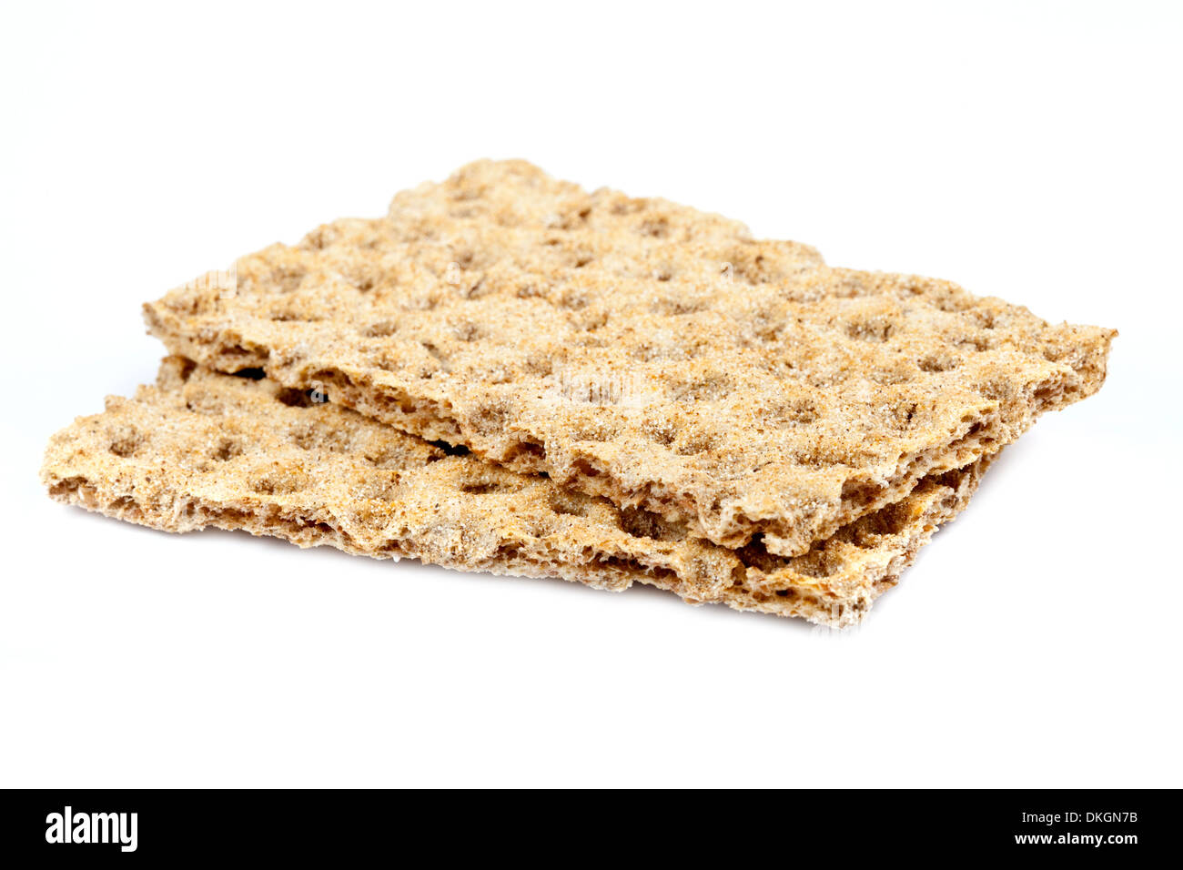 Two crispbread over a plain white background Stock Photo - Alamy