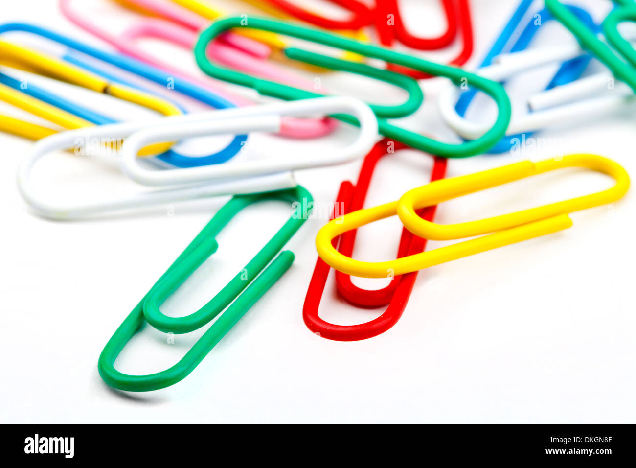 Paper Clips over a white background Stock Photo - Alamy