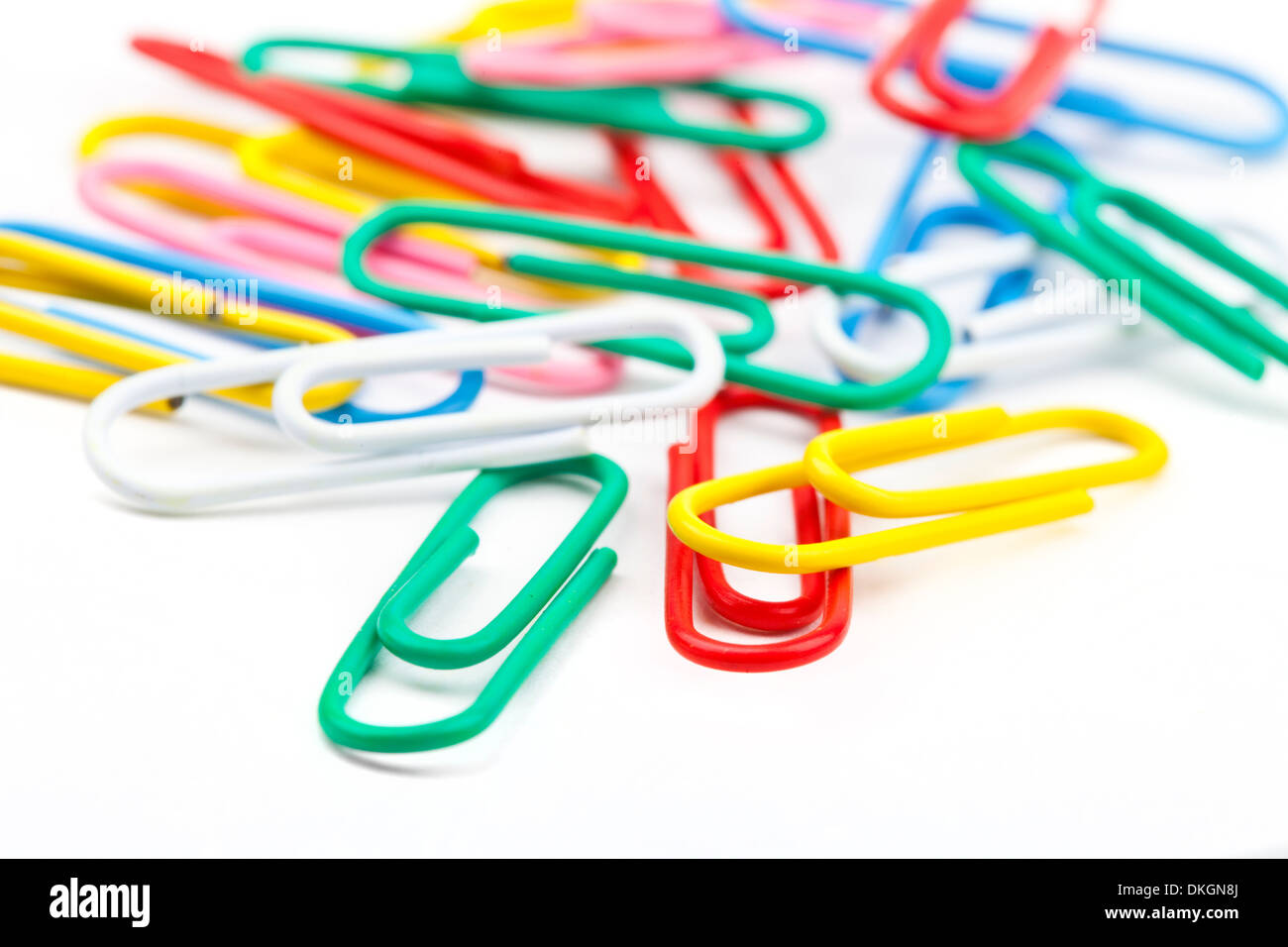 Paper Clips over a white background Stock Photo - Alamy