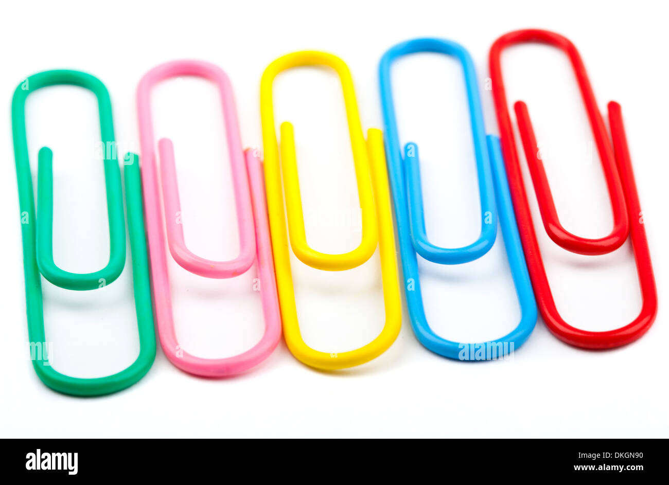 Paper Clips over a white background Stock Photo - Alamy