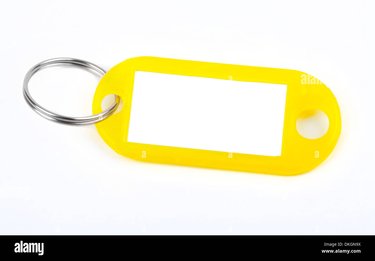 Yellow Key Tag isolated over a white background Stock Photo - Alamy