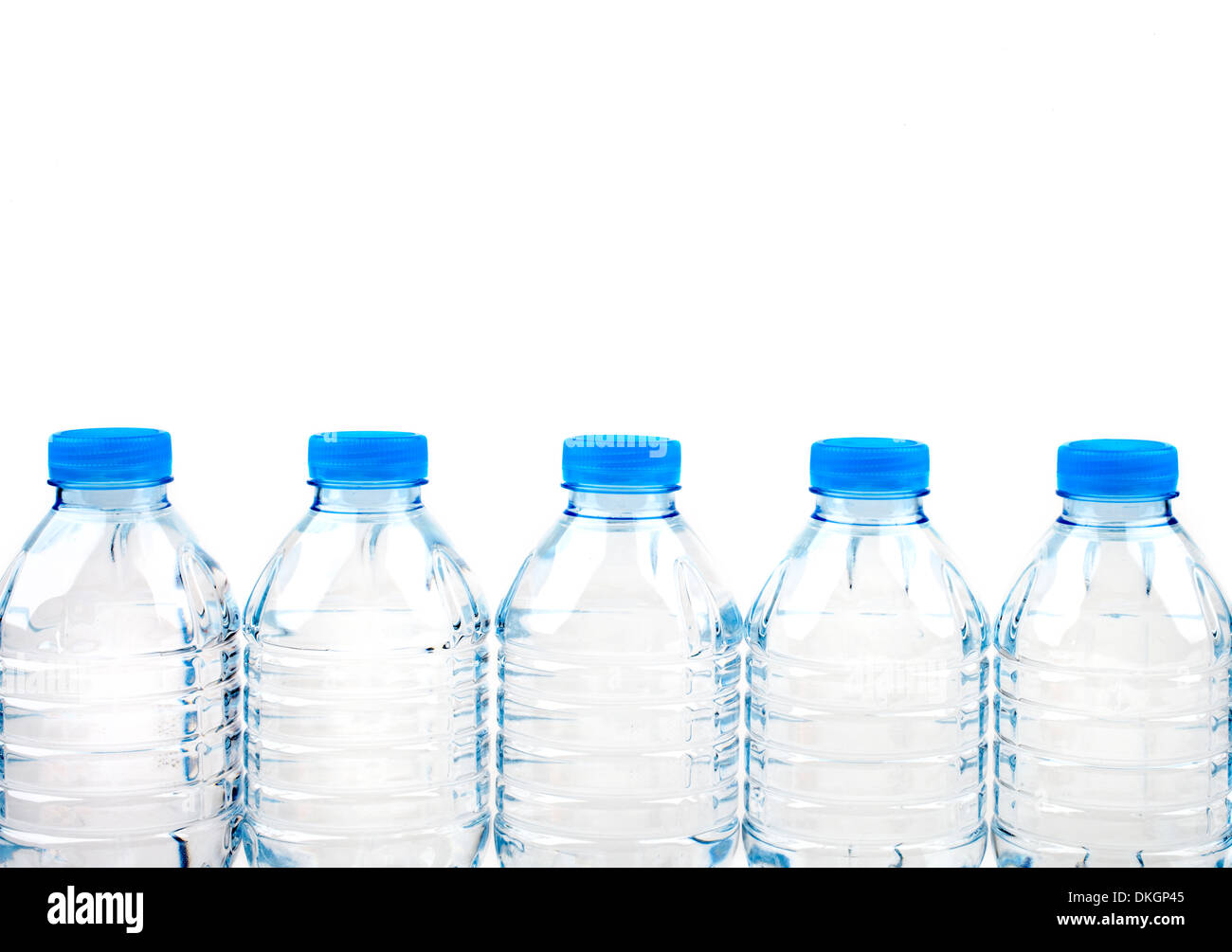 A Line of Bottled Water over a white background Stock Photo - Alamy