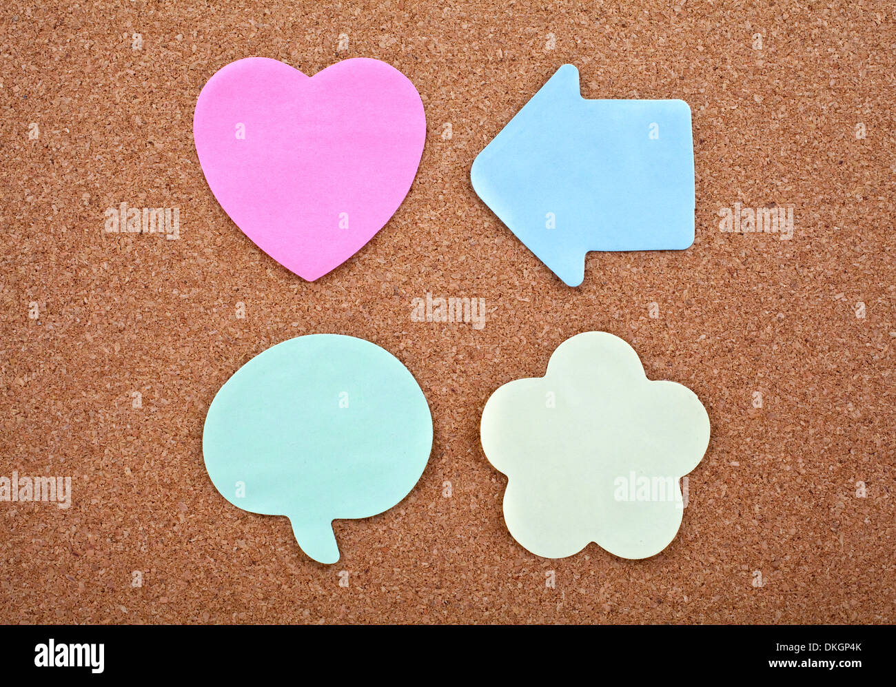Four Different Sticky Notes on a Notice Board Texture Stock Photo - Alamy