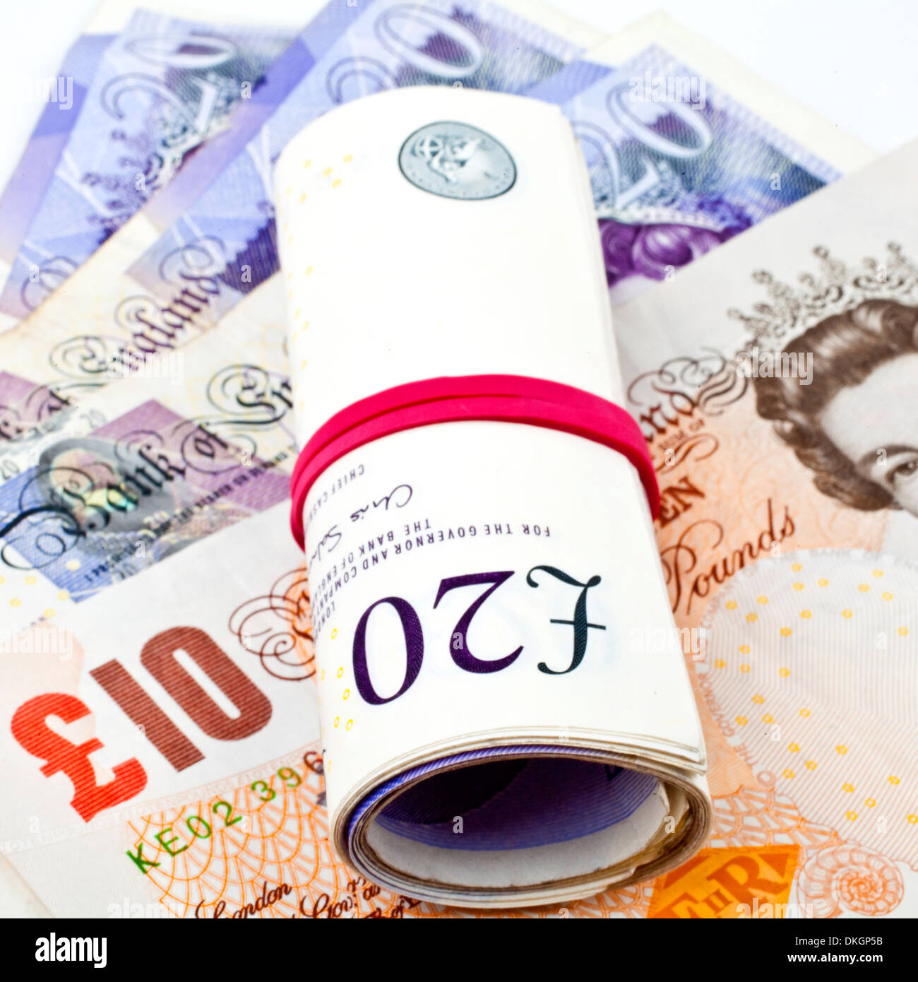British Cash close-up over a white background Stock Photo - Alamy