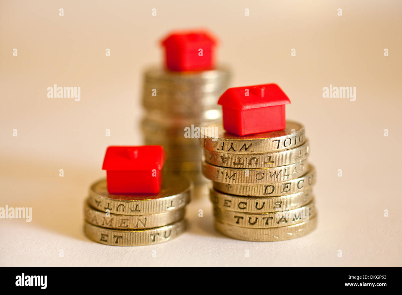 Three piles of pound coins hi-res stock photography and images - Alamy