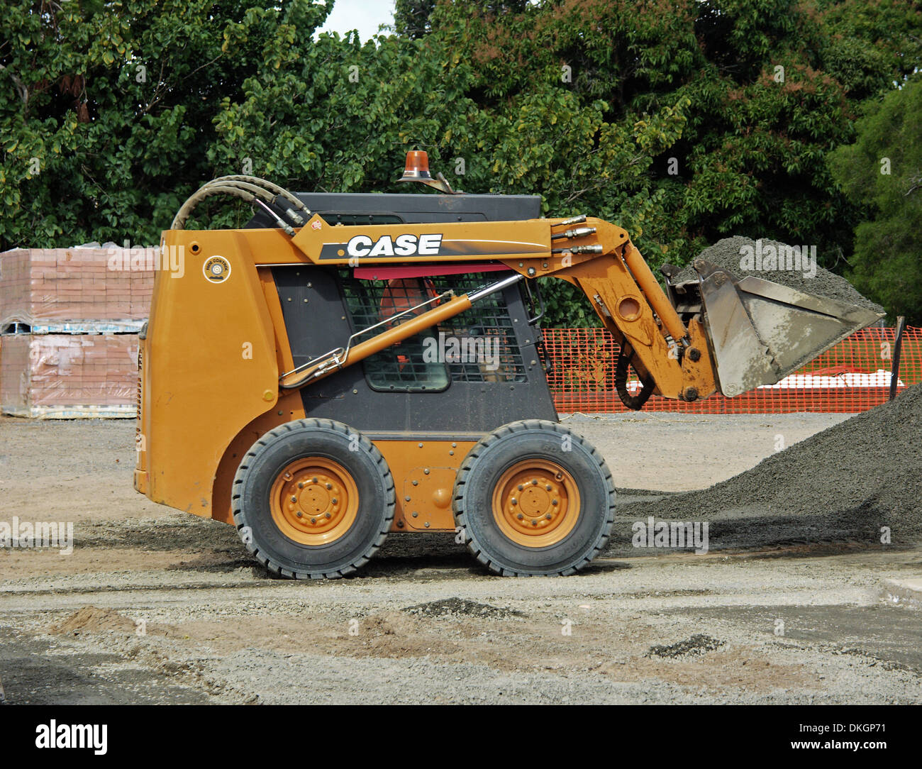 Bobcat earthmoving machinery working in building construction site ...