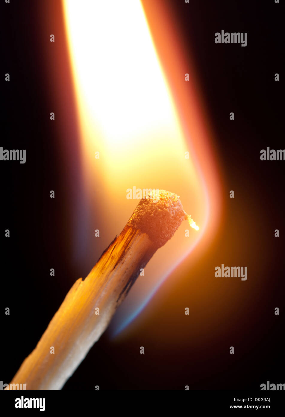 ignition of a match, with smoke on dark background Stock Photo - Alamy