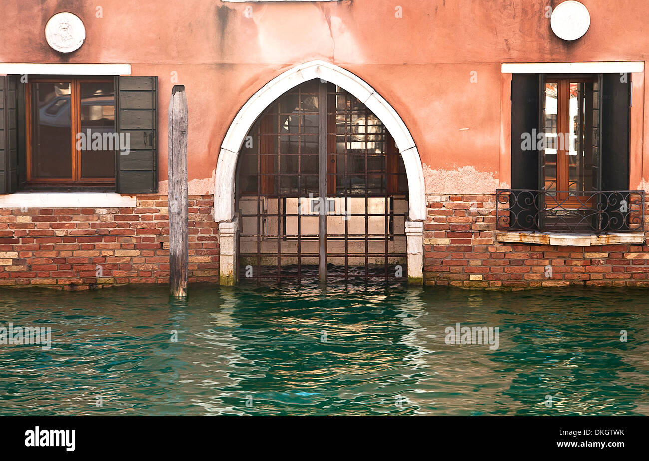 Venice, palace gate flooded on Grand Canal. High water is a recurrent ...