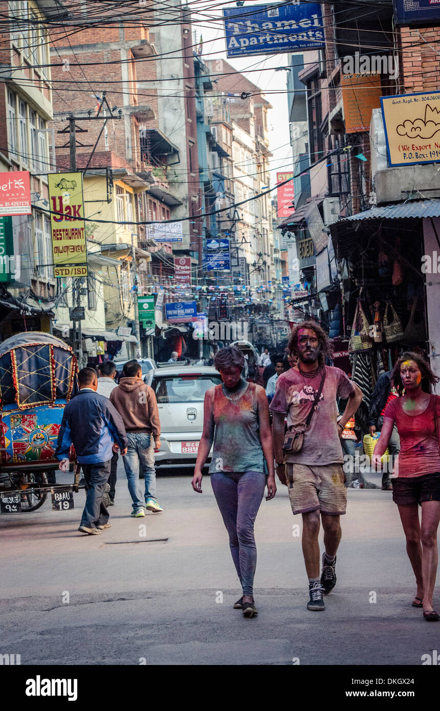 Westerners Covered In Coloured Powder During Holi Festival Celebrations