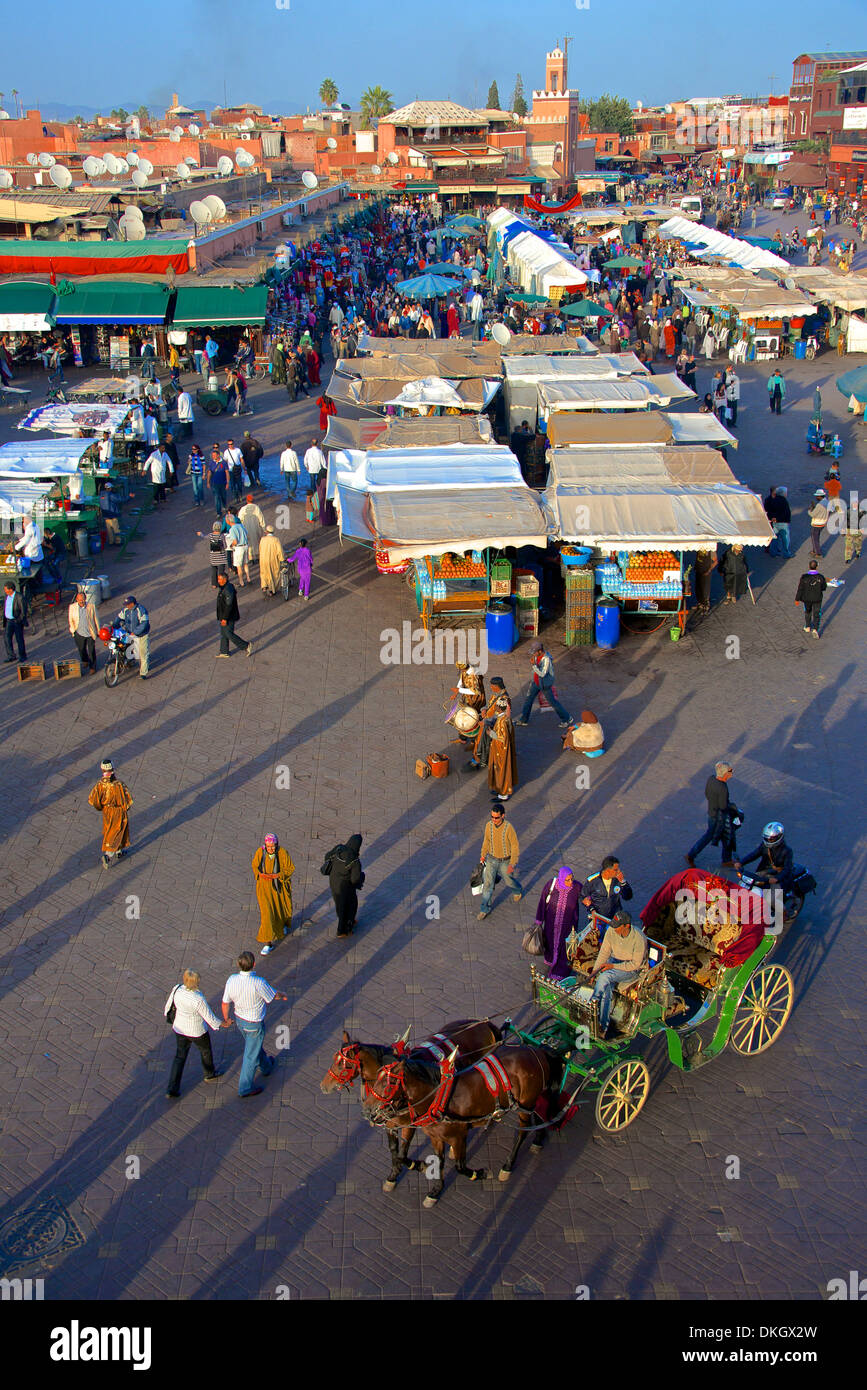 Restaurants, terraces, Kharbouch mosque and minaret, Jemaa-el-Fna ...