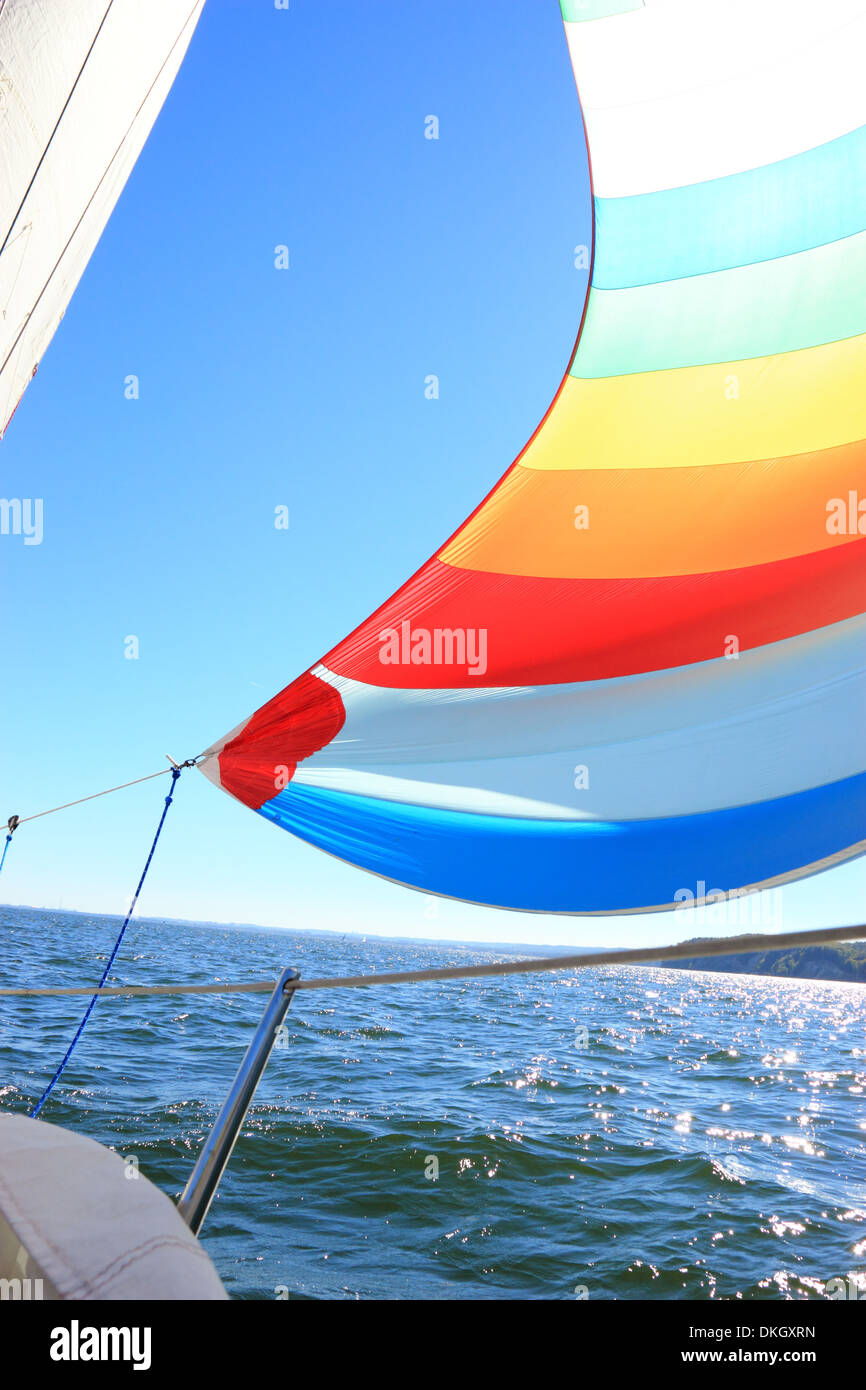 The wind has filled the spinnaker on sailing yacht. Detail of a ...