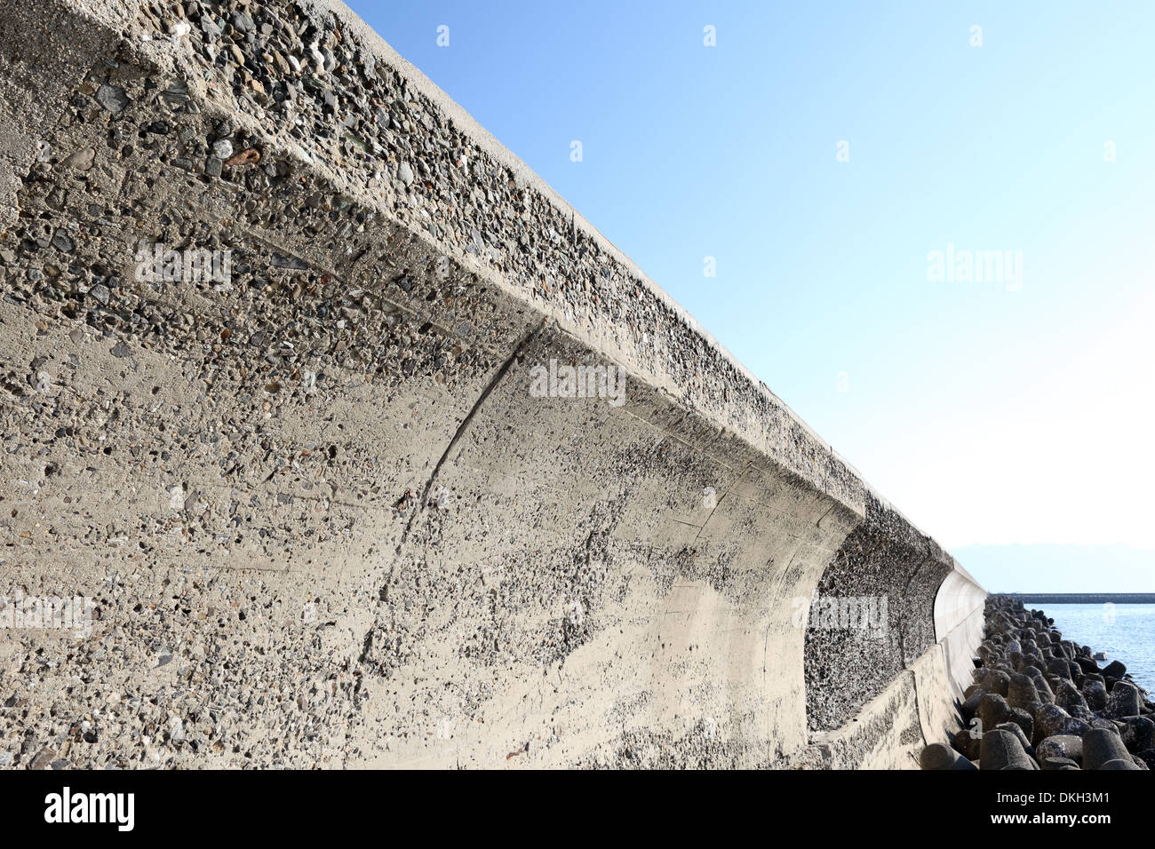Breakwater with concrete blocks for protection of coast Stock Photo - Alamy