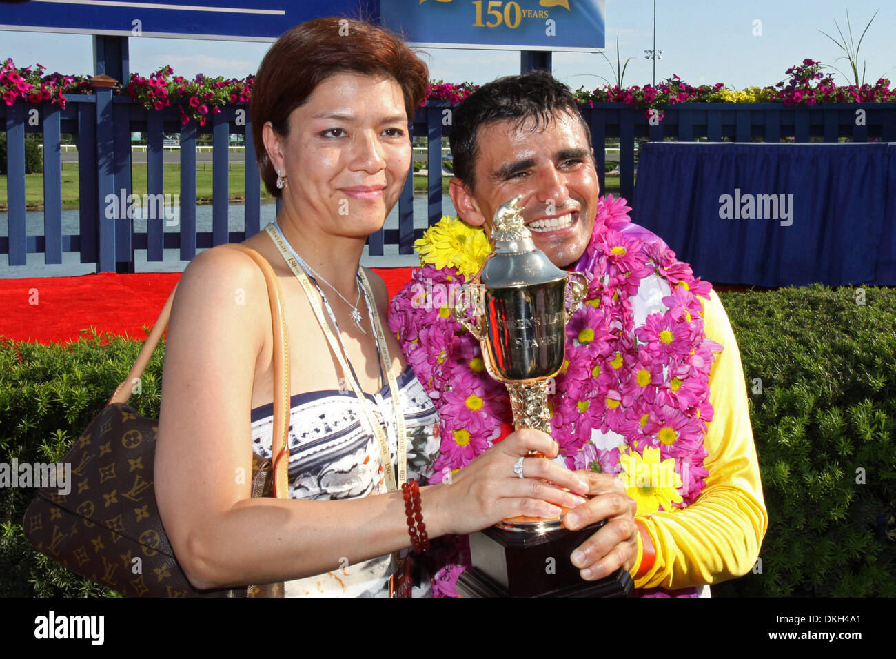 Jockey Eurico Rosa da Silva celebrates with his wife after winning the ...