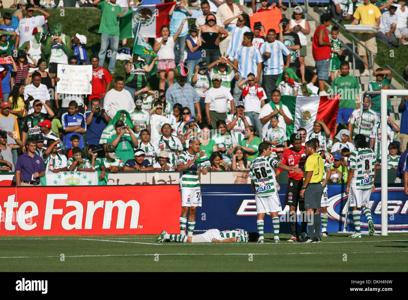 28 June 2009: Players from Club Santos Laguna talk with Referee Jose ...