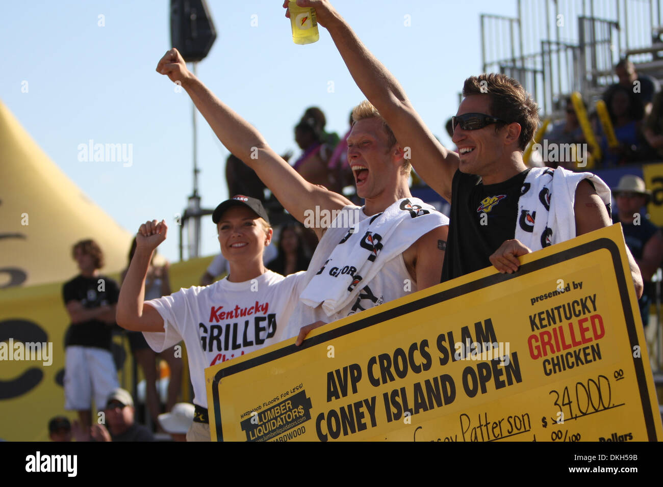 Loomis and Patterson with the prize. Ty Loomis and Casey Patterson def ...