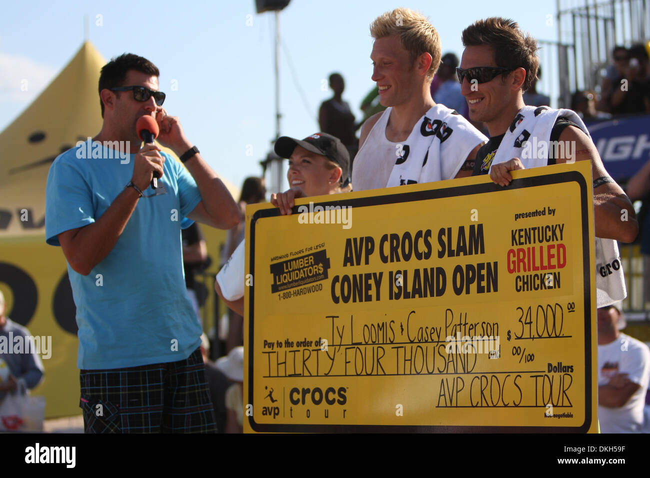 Loomis and Patterson with the prize. Ty Loomis and Casey Patterson def ...