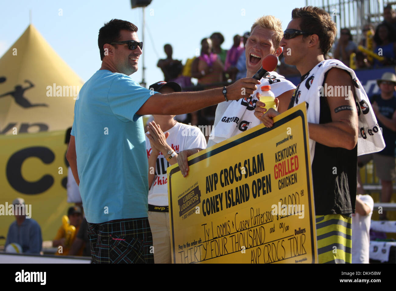 Loomis and Patterson with the prize. Ty Loomis and Casey Patterson def ...