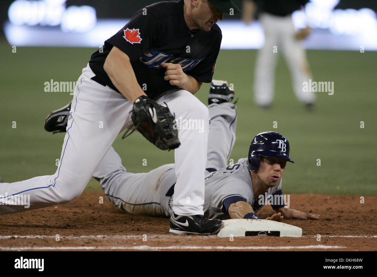 Tampa Bay Rays 2nd baseman Ben Zobrist slides back into 1st base as ...