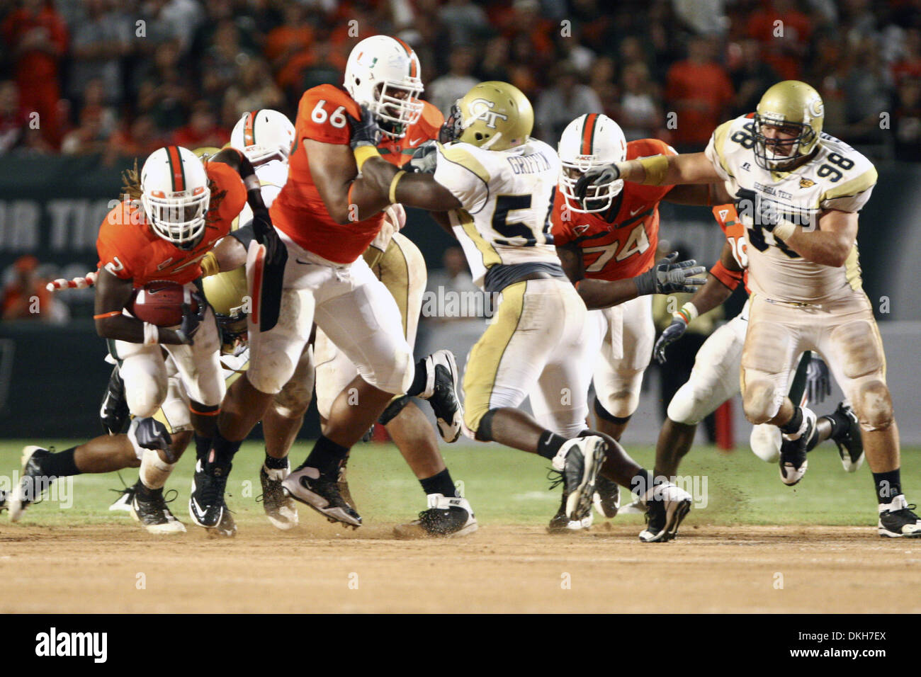 Miami Hurricanes running back Graig Cooper rushes with blocking from ...