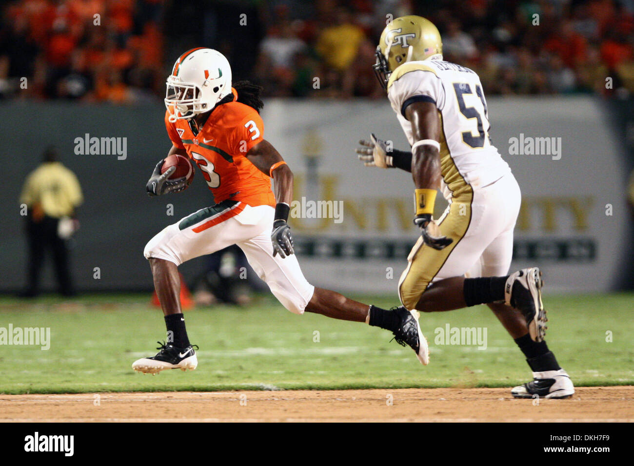 Miami Hurricanes wide receiver Travis Benjamin (3) runs downfield as ...