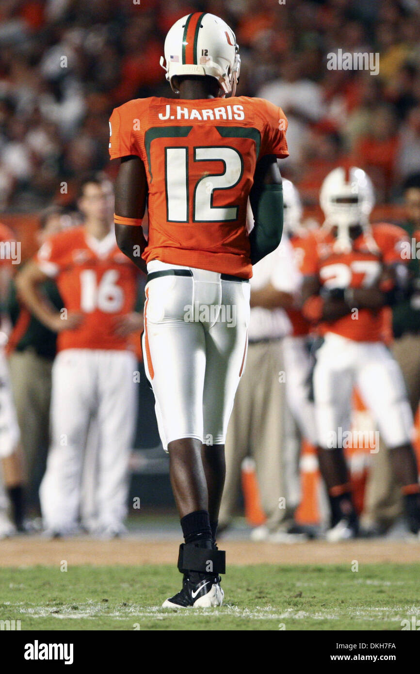 Miami Hurricanes quarterback Jacory Harris (12) looks to his coaches ...