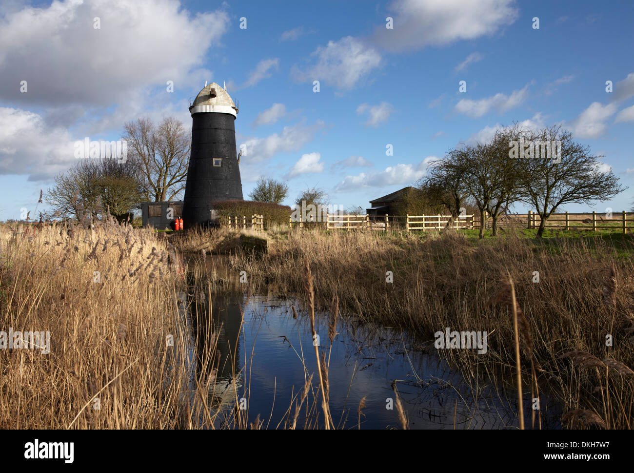 A bright winter day in the Norfolk Broads showing Tall Mill near Upton ...