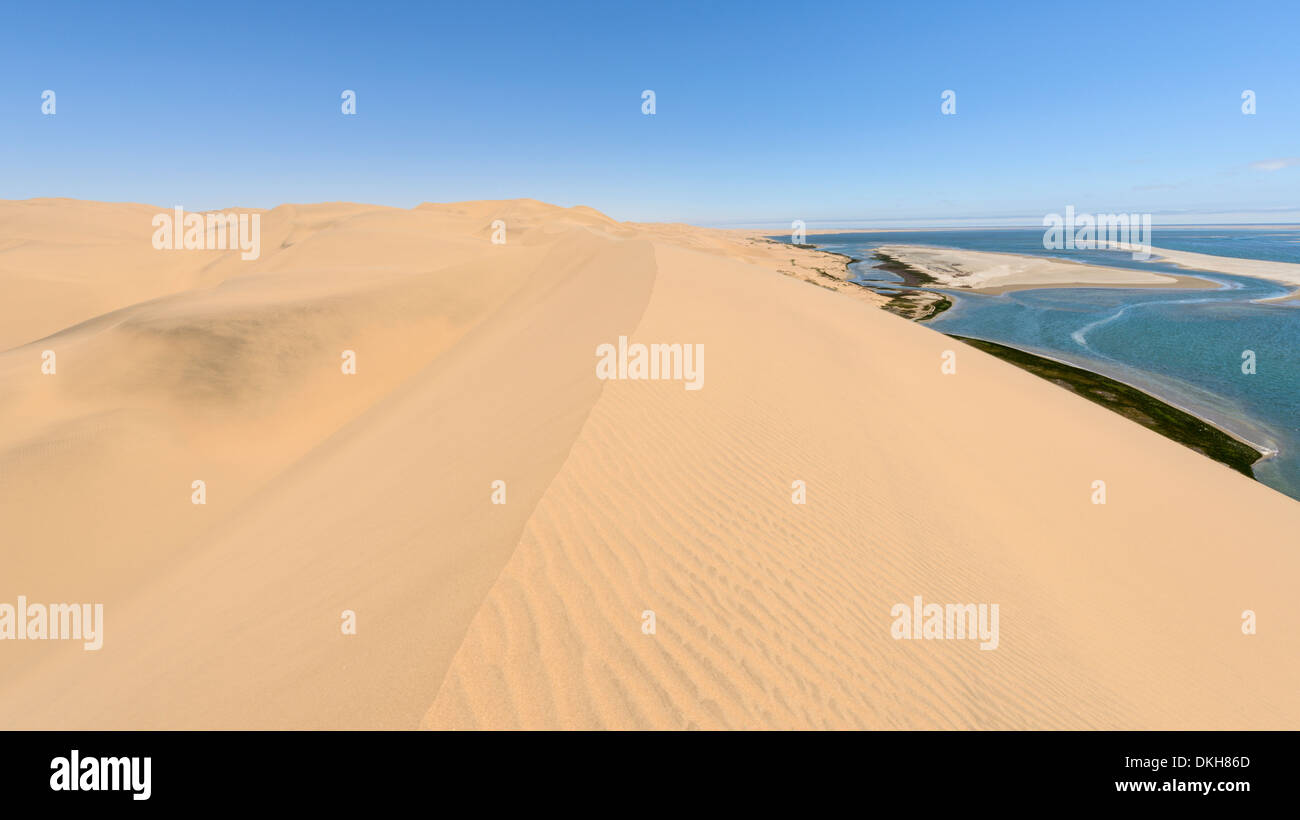 The dunes and lagoon of Sandwich Harbour, just south of Walvis Bay and ...
