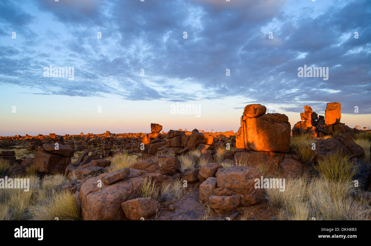 Boulders and grasses at sunrise, Giant's Playground, Keetmanshoop ...