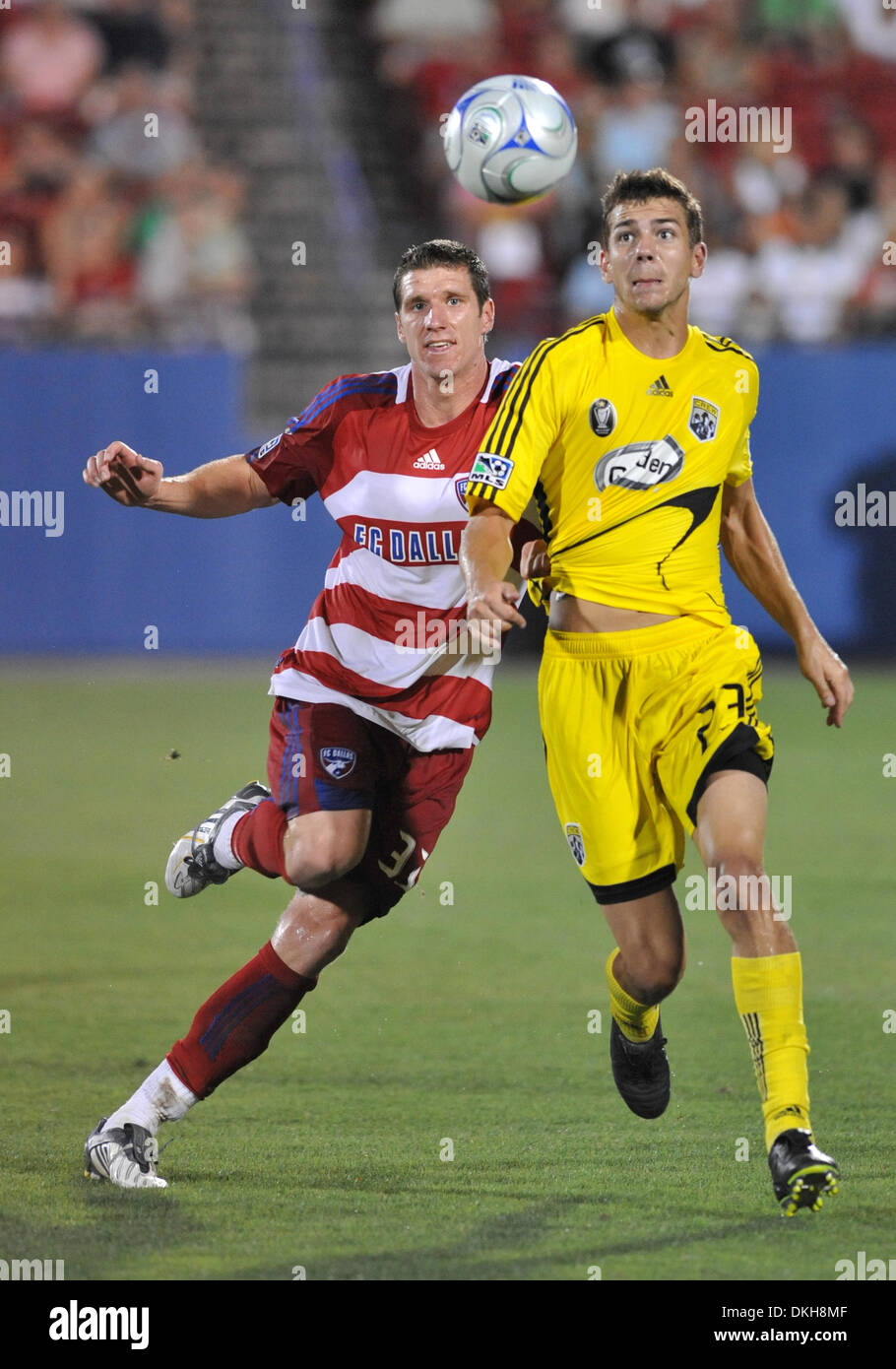 Defender Eric Brunner holds off Kenny Cooper as FC Dallas defeats ...