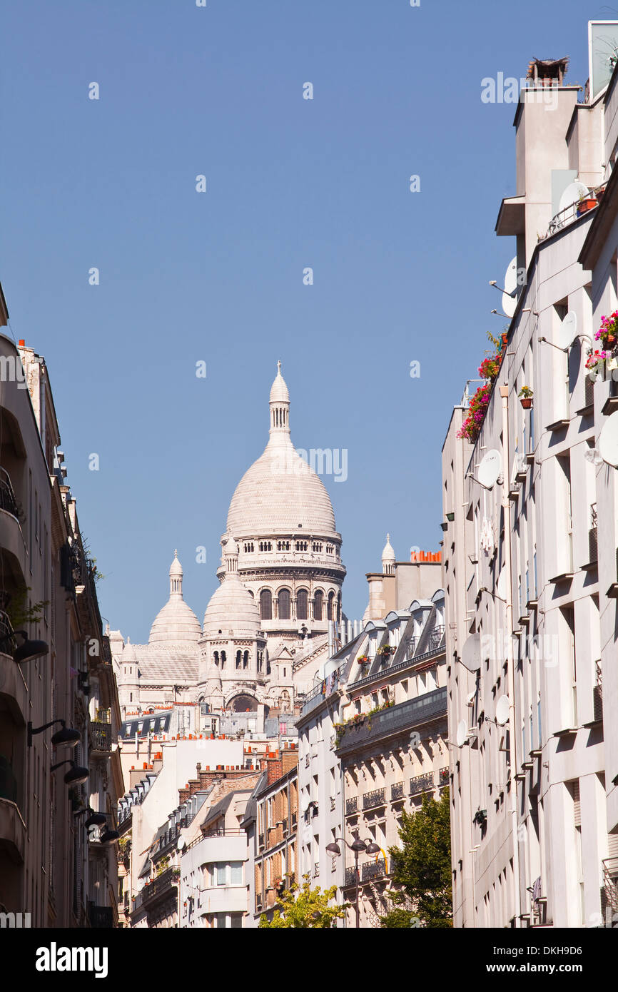 The Basilica of Sacre Coeur through the streets of Montmartre, Paris ...