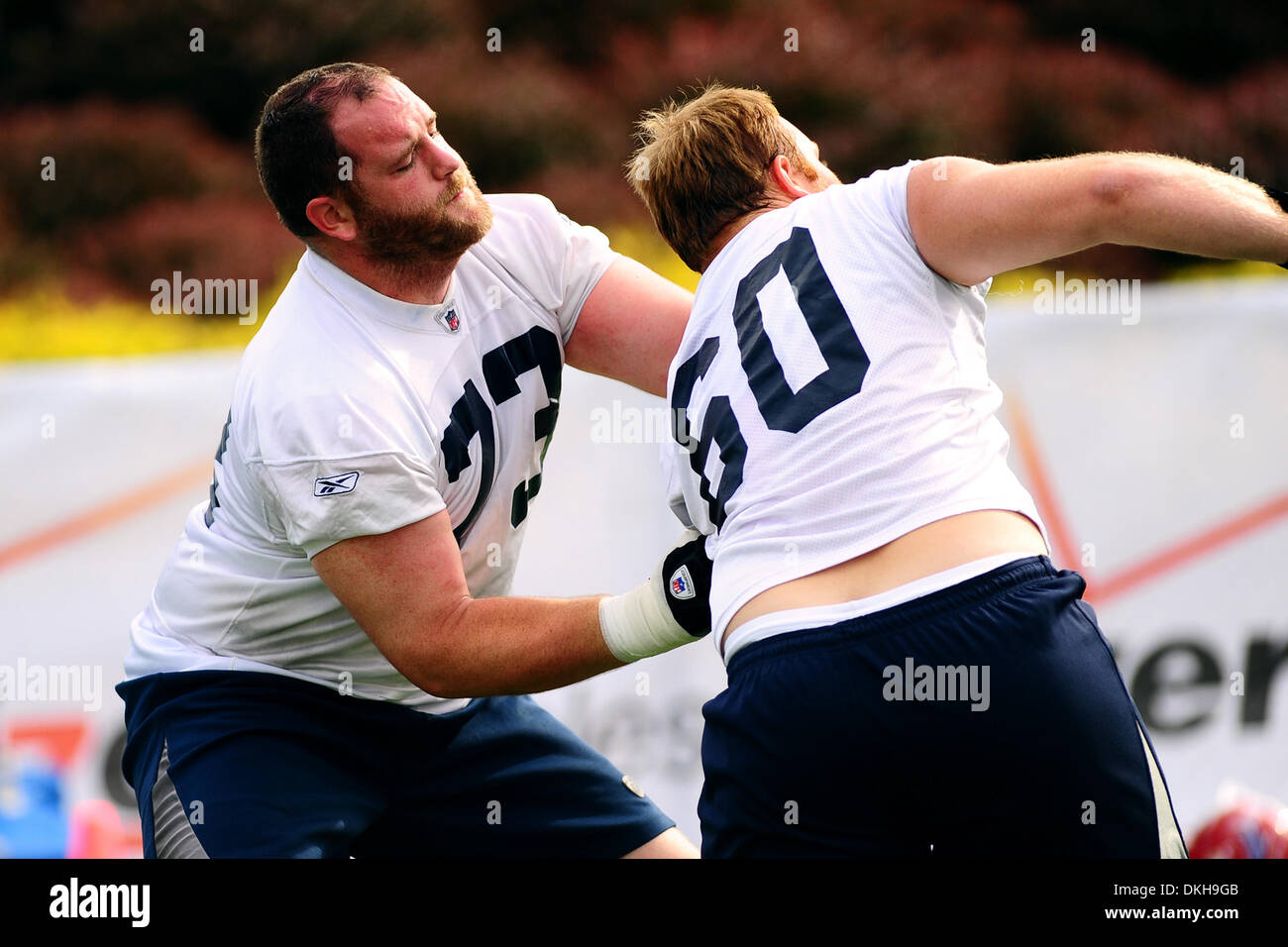 Buffalo lineman Kirk Chambers (left) works on pass blocking with ...