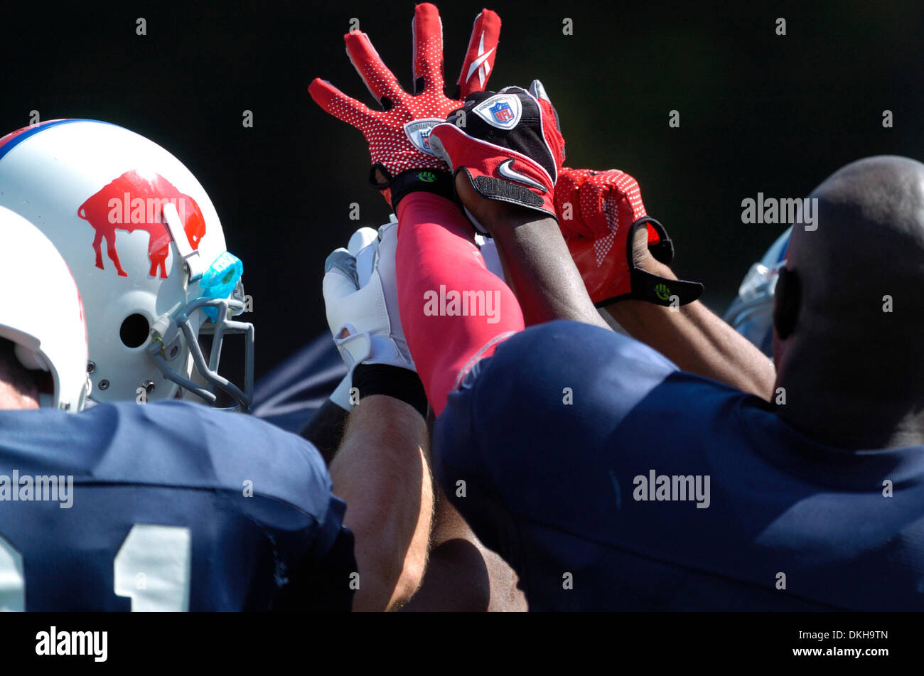 Buffalo Bills defensive team in a huddle during training camp at ...