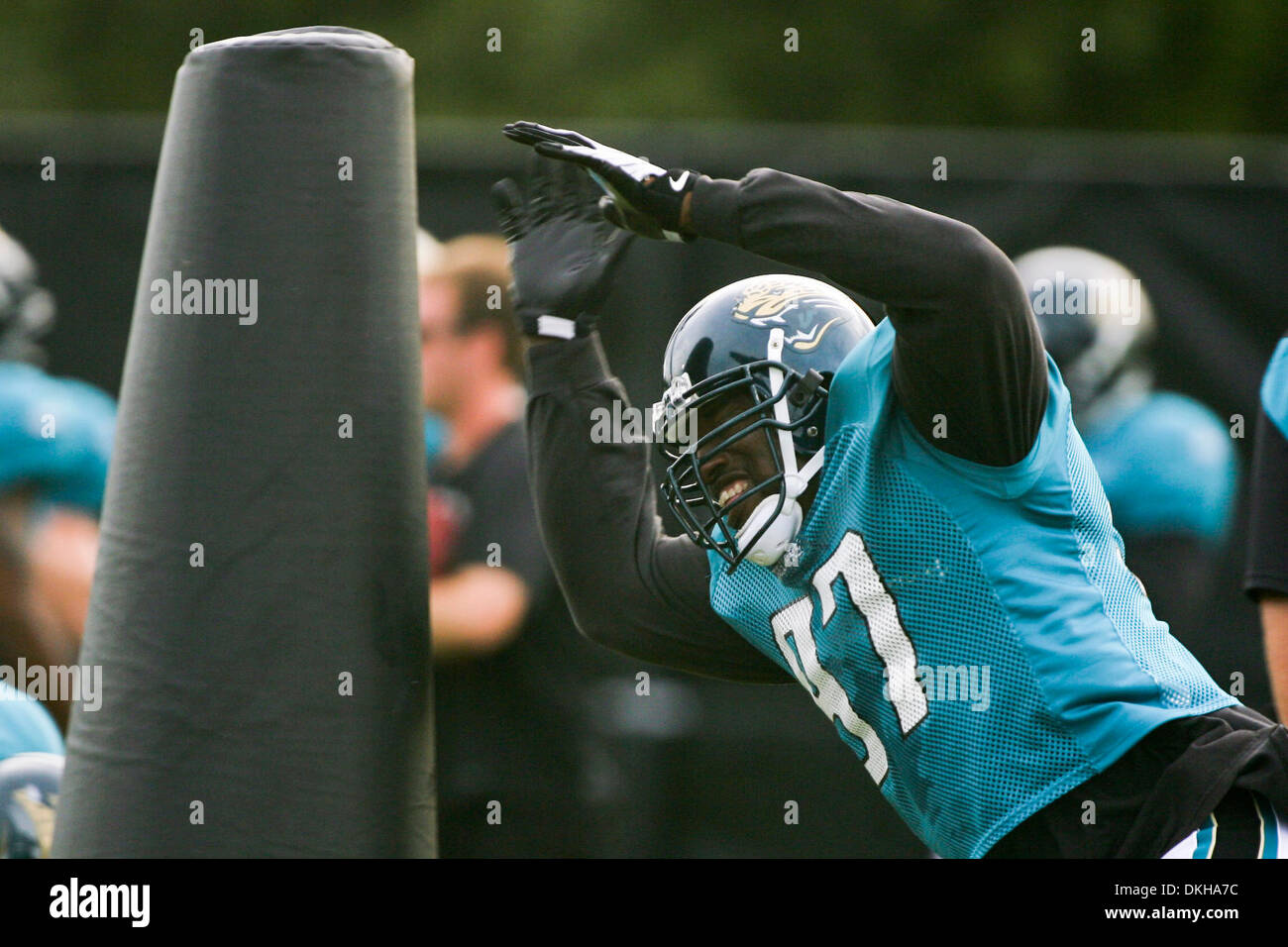 Jacksonville Jaguars defensive end Reggie Hayward (97) does drills ...
