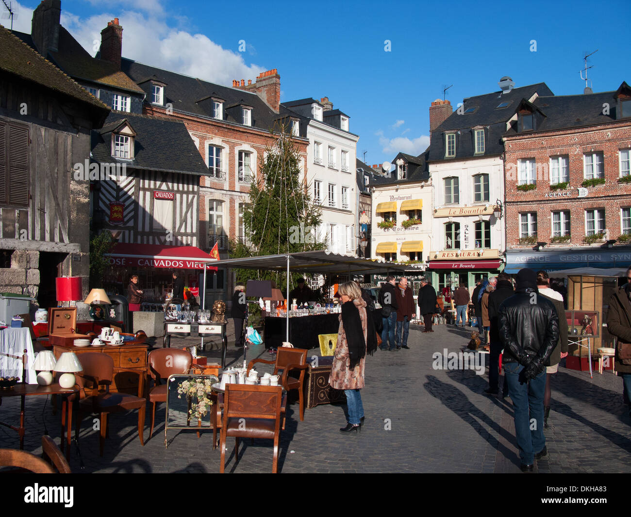 NORMANDY, FRANCE. Antiques market in the picturesque medieval town of ...