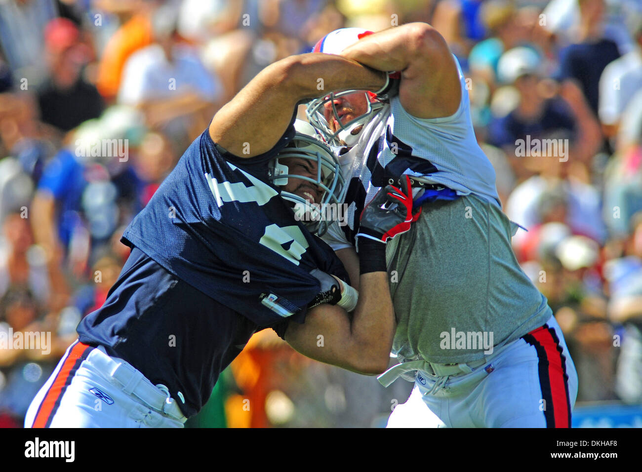 Buffalo Bills defensive end Ataefiok Etukeren ,left, battles tight end ...