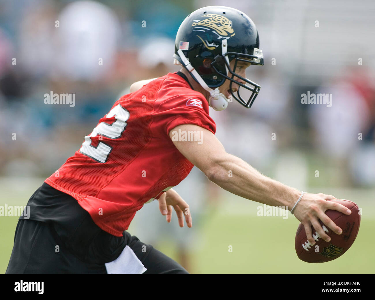 Jacksonville Jaguars quarterback Paul Smith (12) hands off the ball ...