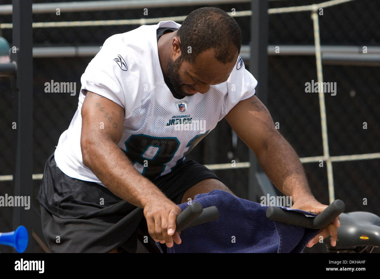 Jacksonville Jaguars wide receiver Tory Holt rides an exercise bike ...