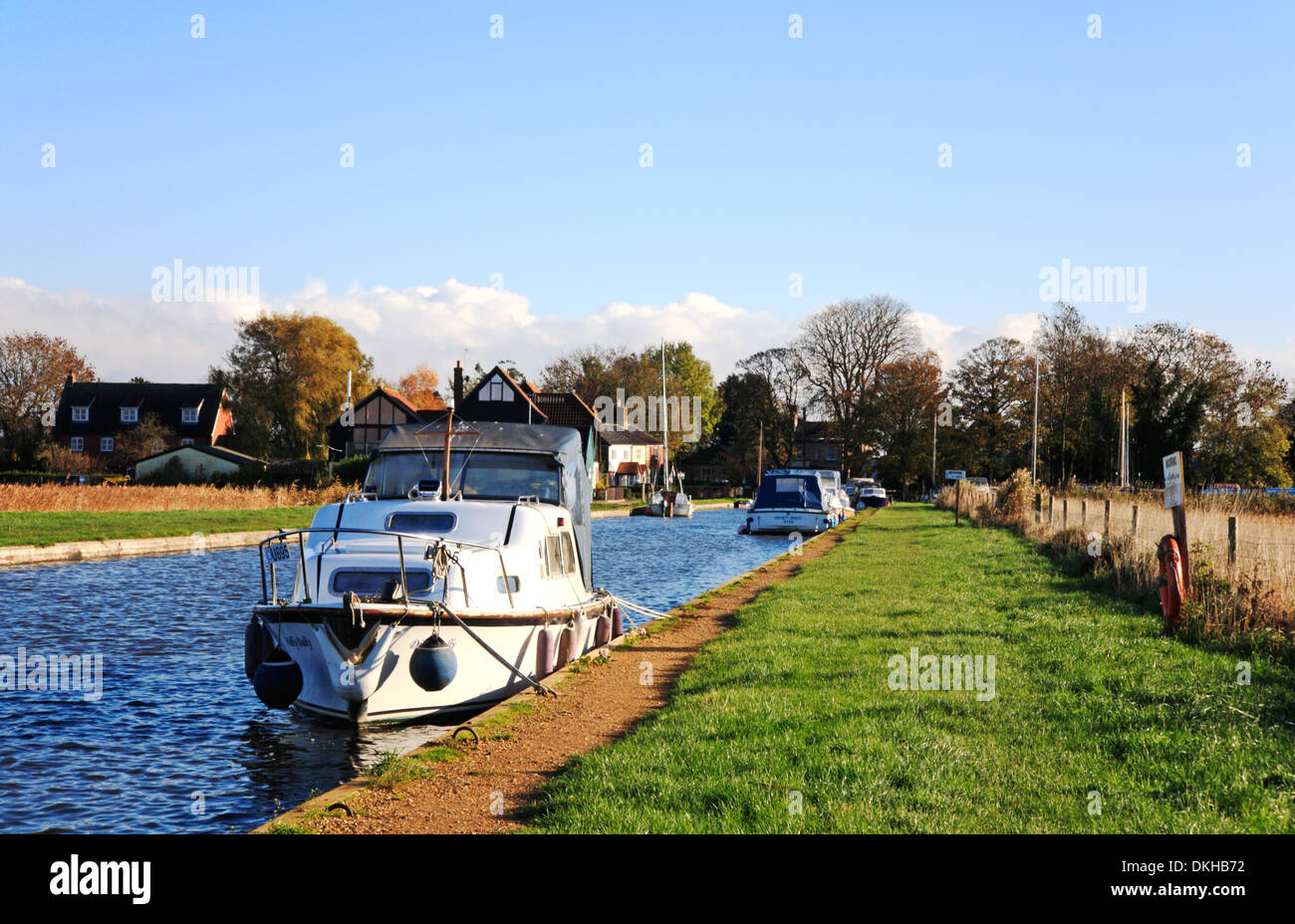 A view of boats moored in Thurne Dyke on the Norfolk Broads at Thurne, Norfolk, England, United ...