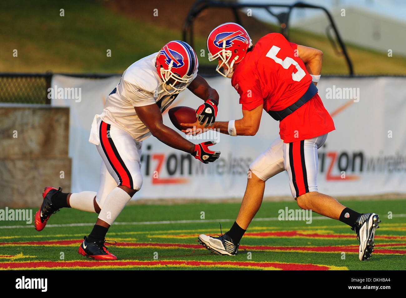Buffalo Bills quarterback hands off the ball to runningback Bruce Hall ...