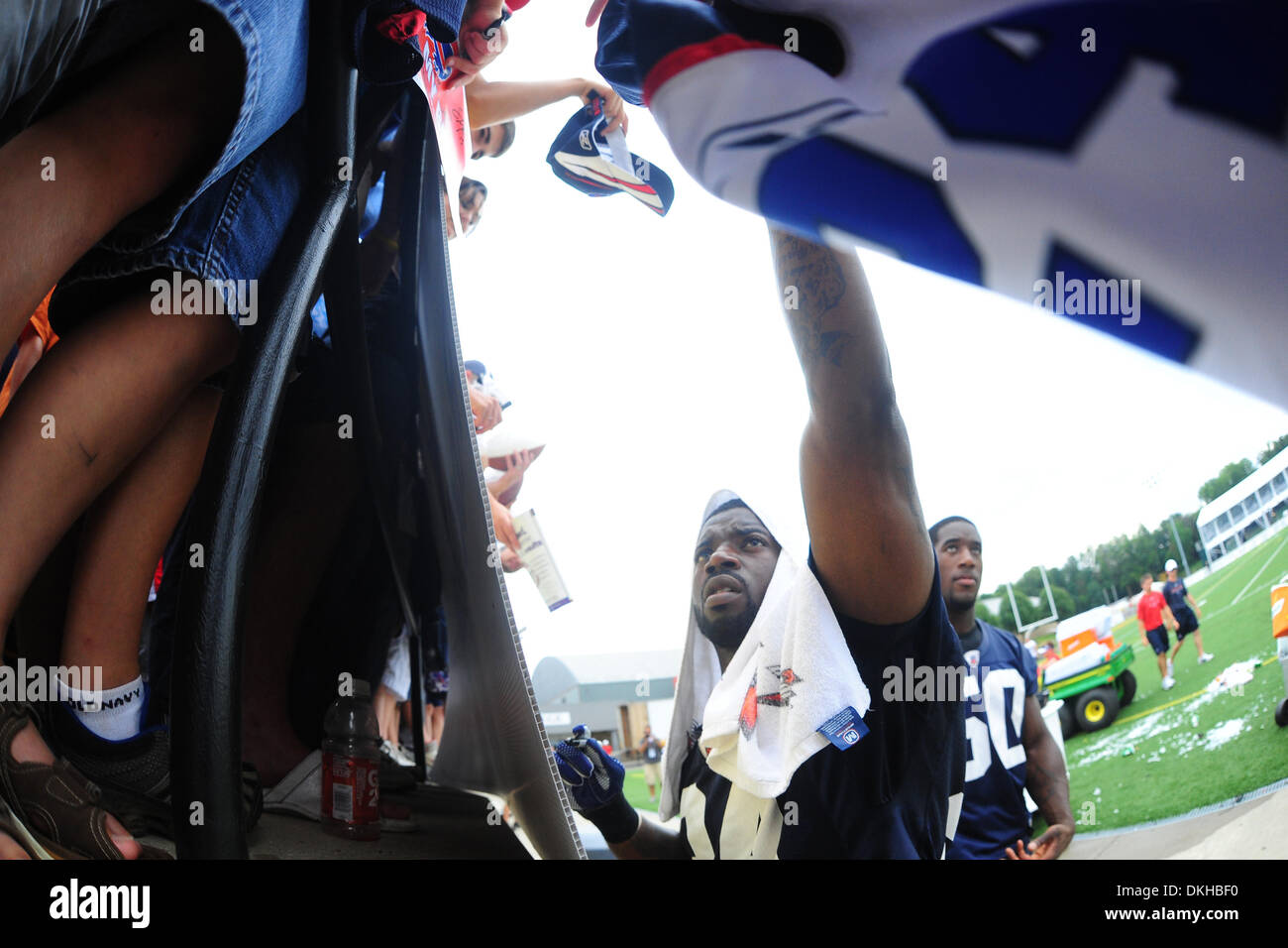 Buffalo Bills cornerback Terrence McGee hands a jersey back to a fan ...