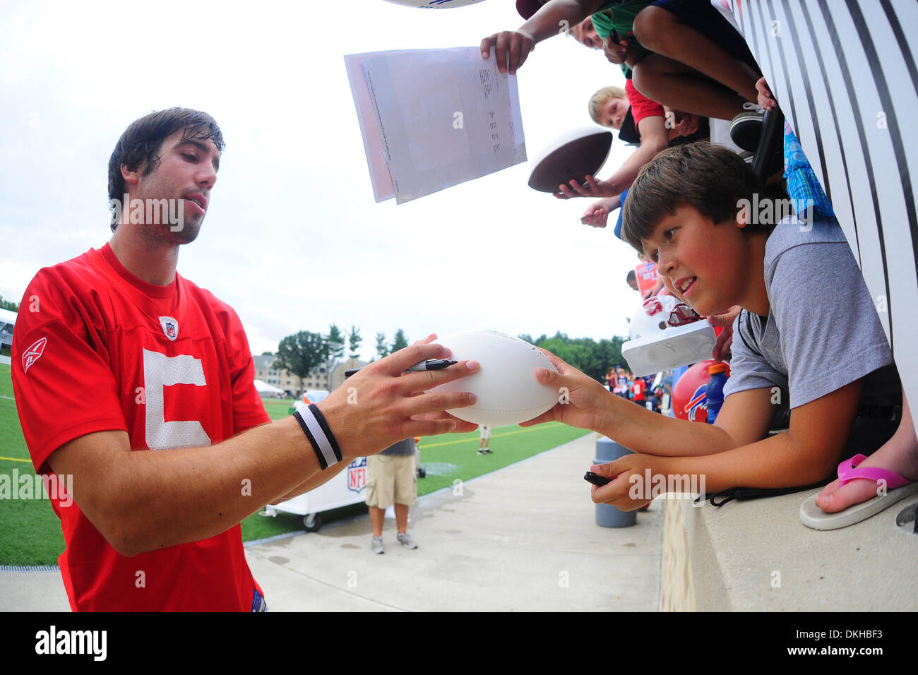 Buffalo Bills quarterback Trent Edwards takes a young fans football to ...
