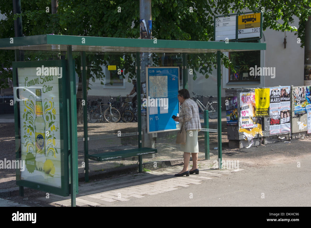 Busstop woman hi-res stock photography and images - Alamy