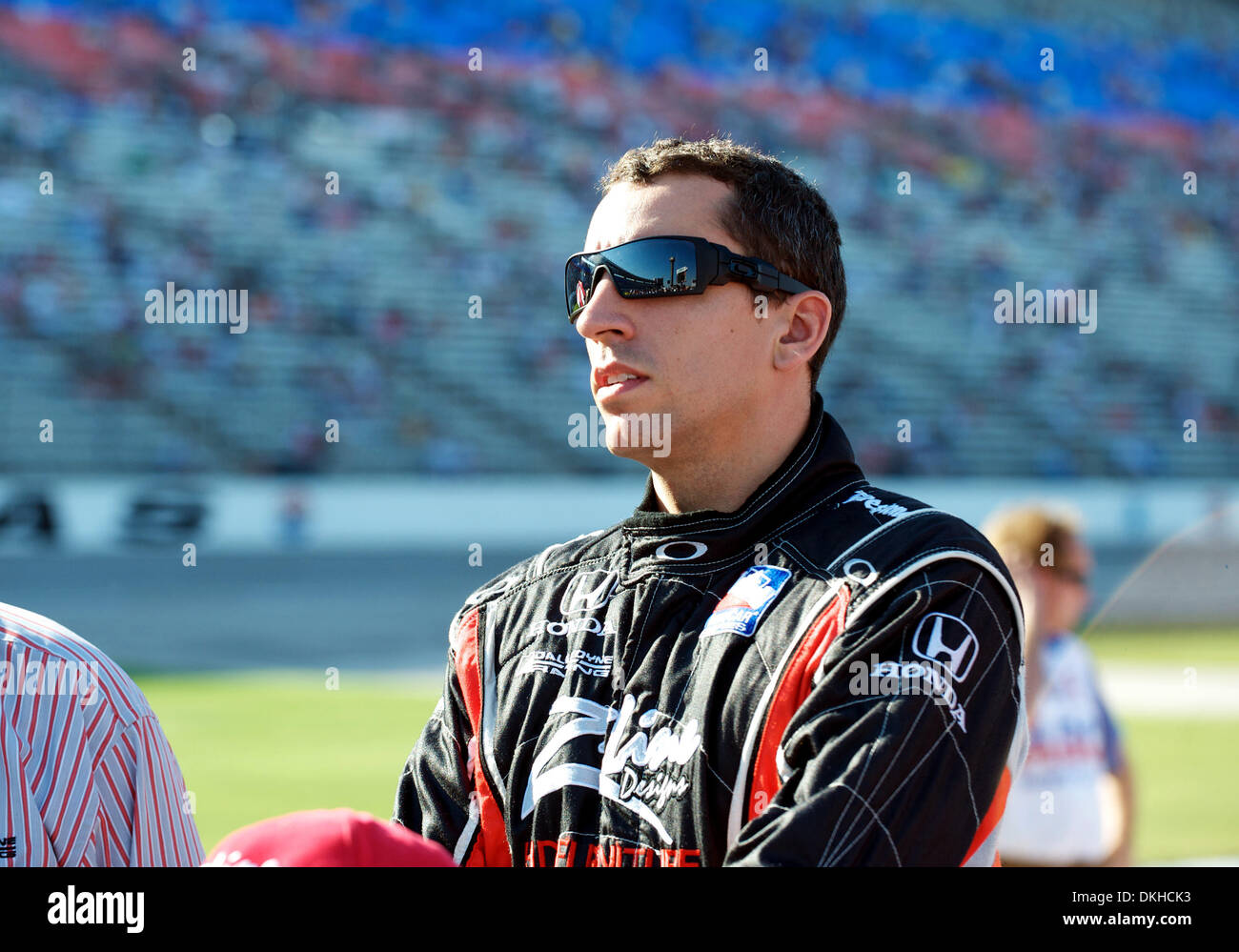 Dale Coyne Racing driver Justin Wilson watches the positions on the ...