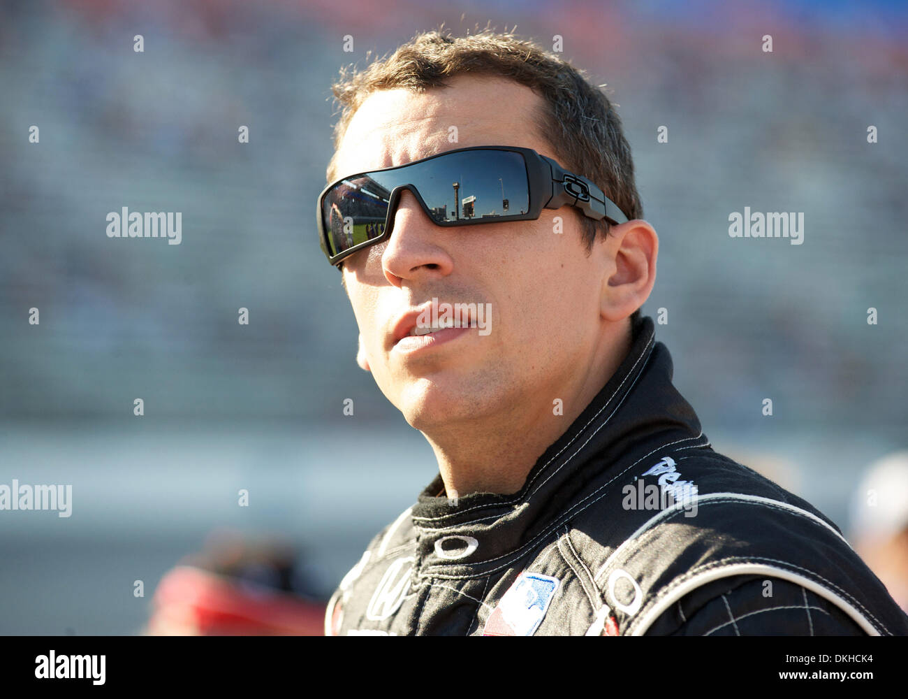 Dale Coyne Racing driver Justin Wilson watches the positions on the ...